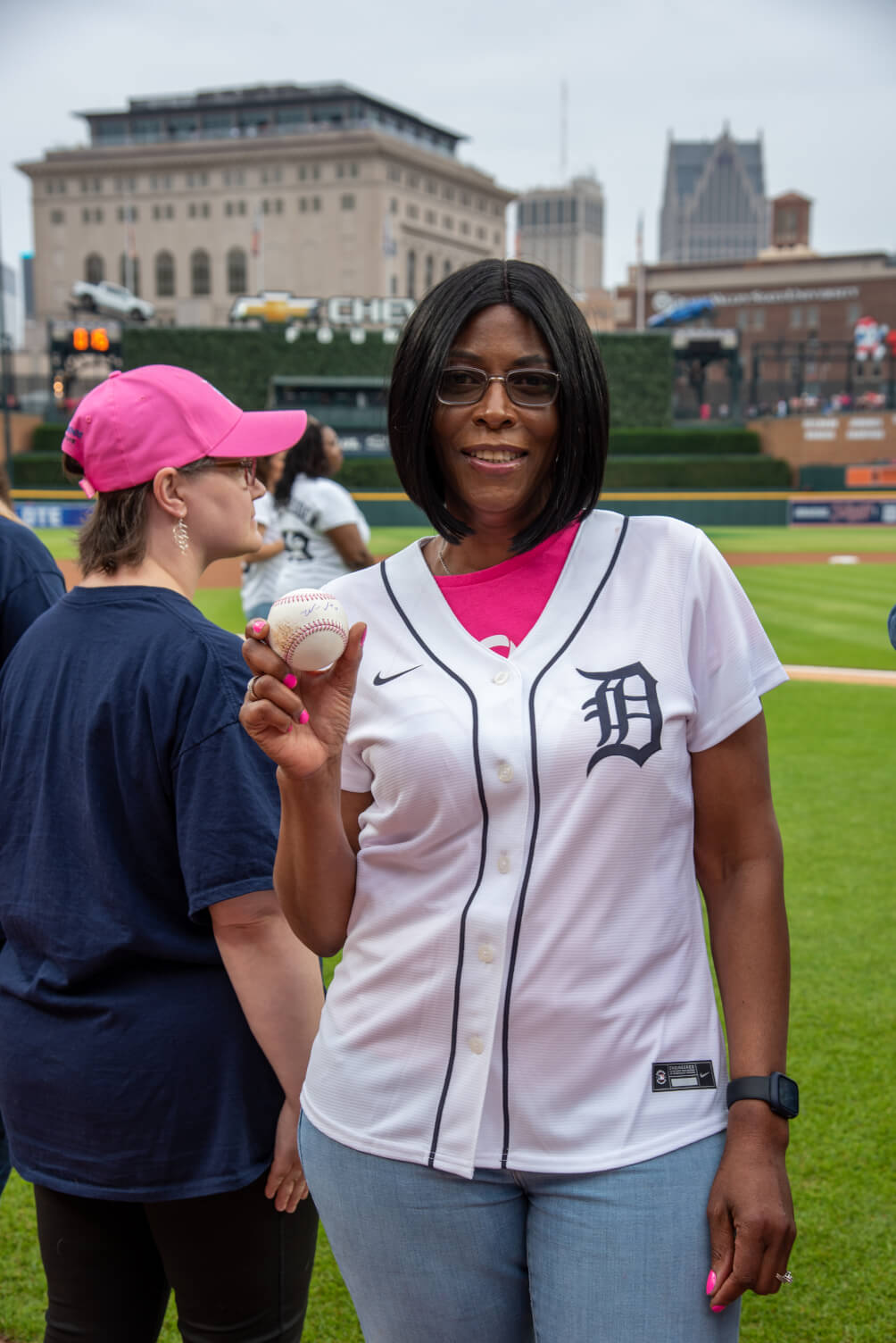 Tigers fans joined Karmanos and McLaren, dressed in pink to honor breast cancer survivors and ...